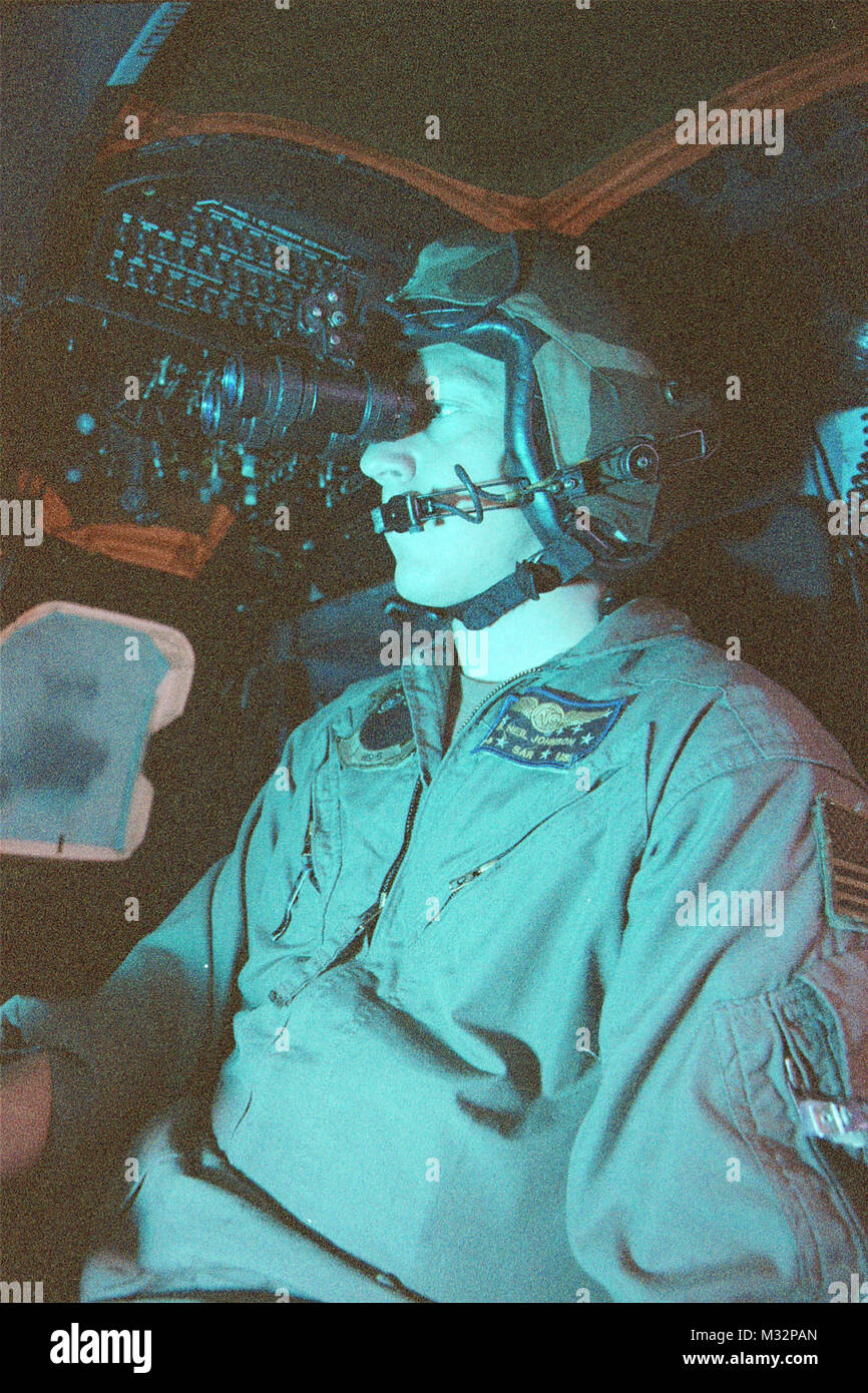 AW2 (SAR) FROM HS-5 DEMOSTRATES THE USE OF NVGs IN THE SH-60F/H. **NOTE ...