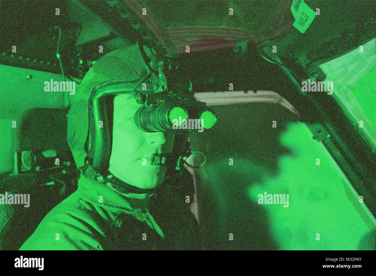 AW2 (SAR) FROM HS-5 DEMOSTRATES THE USE OF NVGs IN THE SH-60F/H. **NOTE ...
