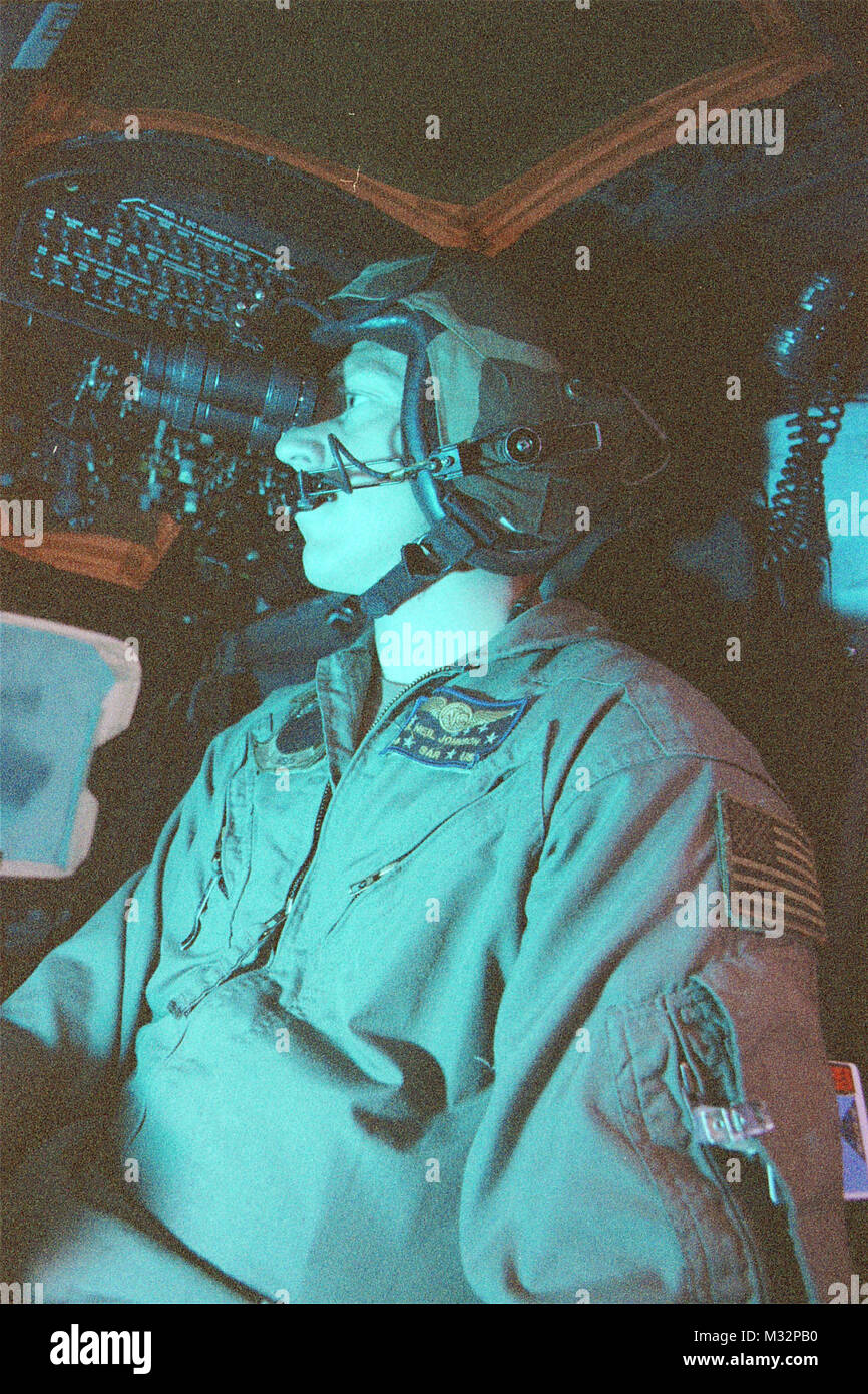 AW2 (SAR) FROM HS-5 DEMOSTRATES THE USE OF NVGs IN THE SH-60F/H. **NOTE ...