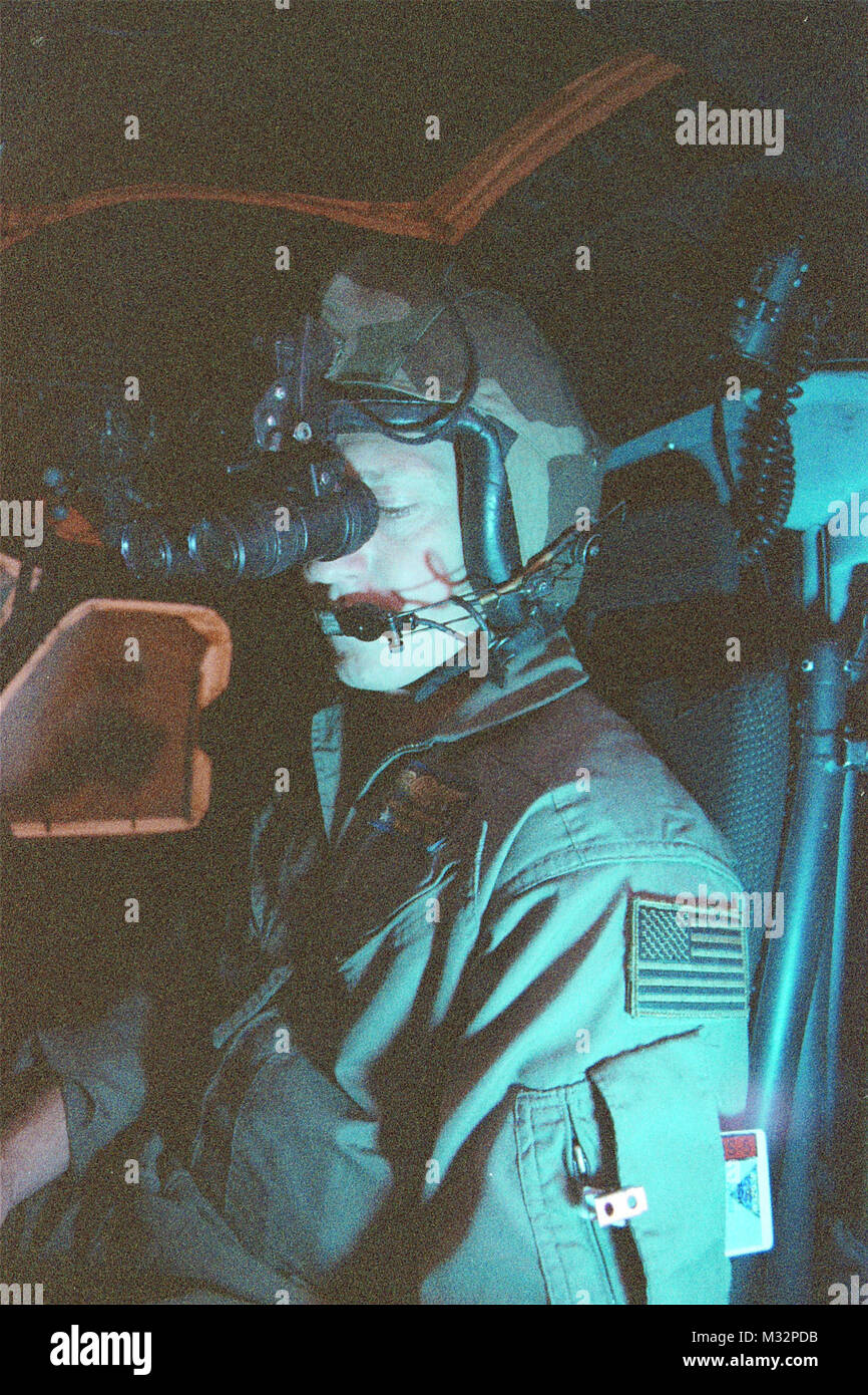AW2 (SAR) FROM HS-5 DEMOSTRATES THE USE OF NVGs IN THE SH-60F/H. **NOTE ...