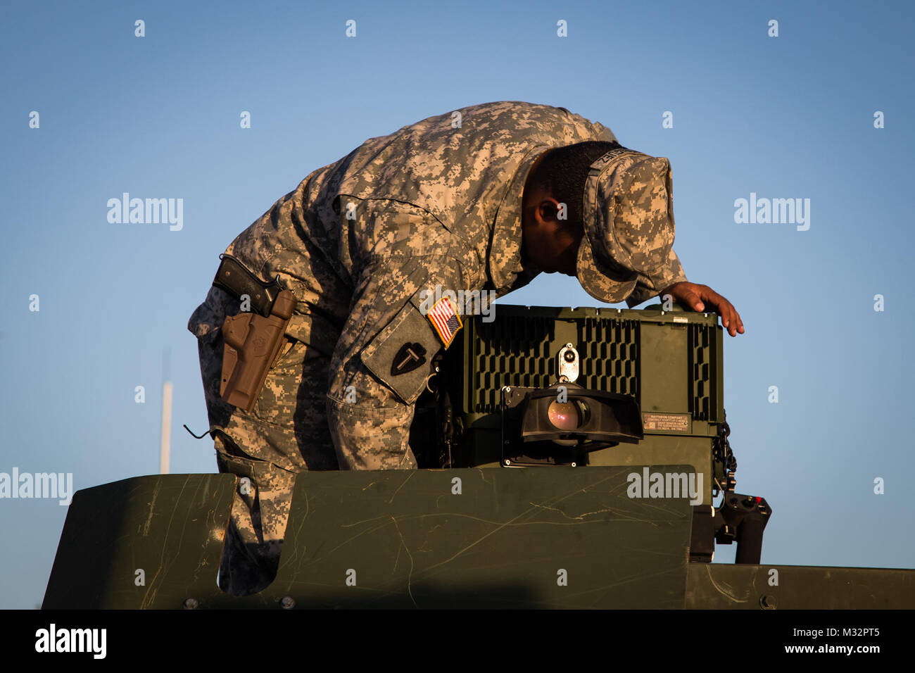 A soldier from the 36th Infantry Division, Texas Army National Guard ...