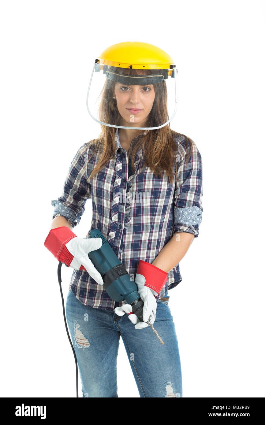 Attractive young woman builder with drill tool happy for good work ...