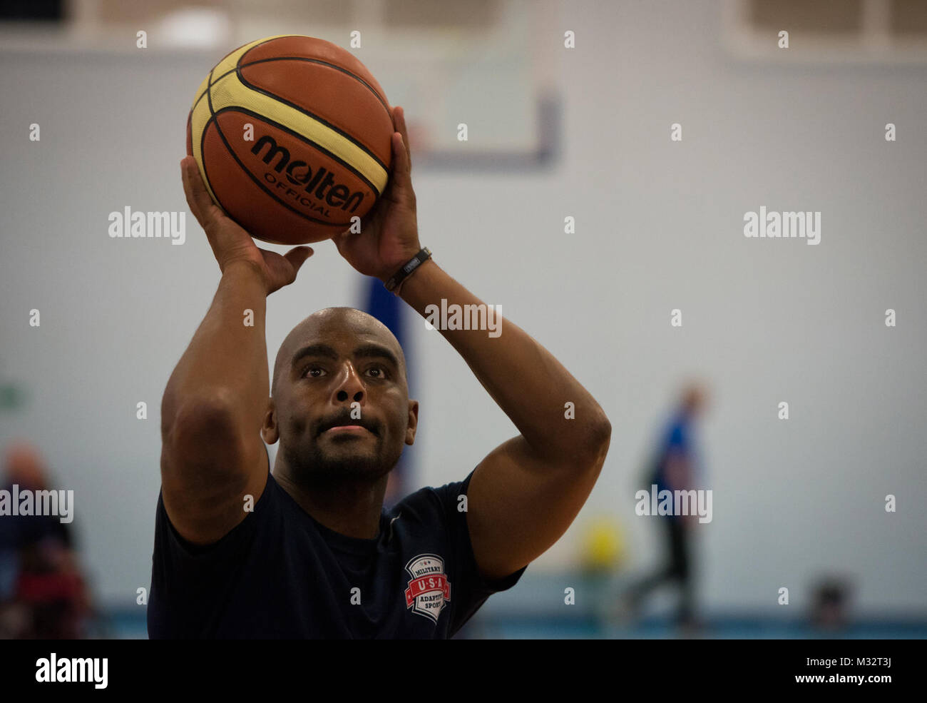 Delvin Maston, a retired U.S. Army staff sergeant, shoots a free throw ...