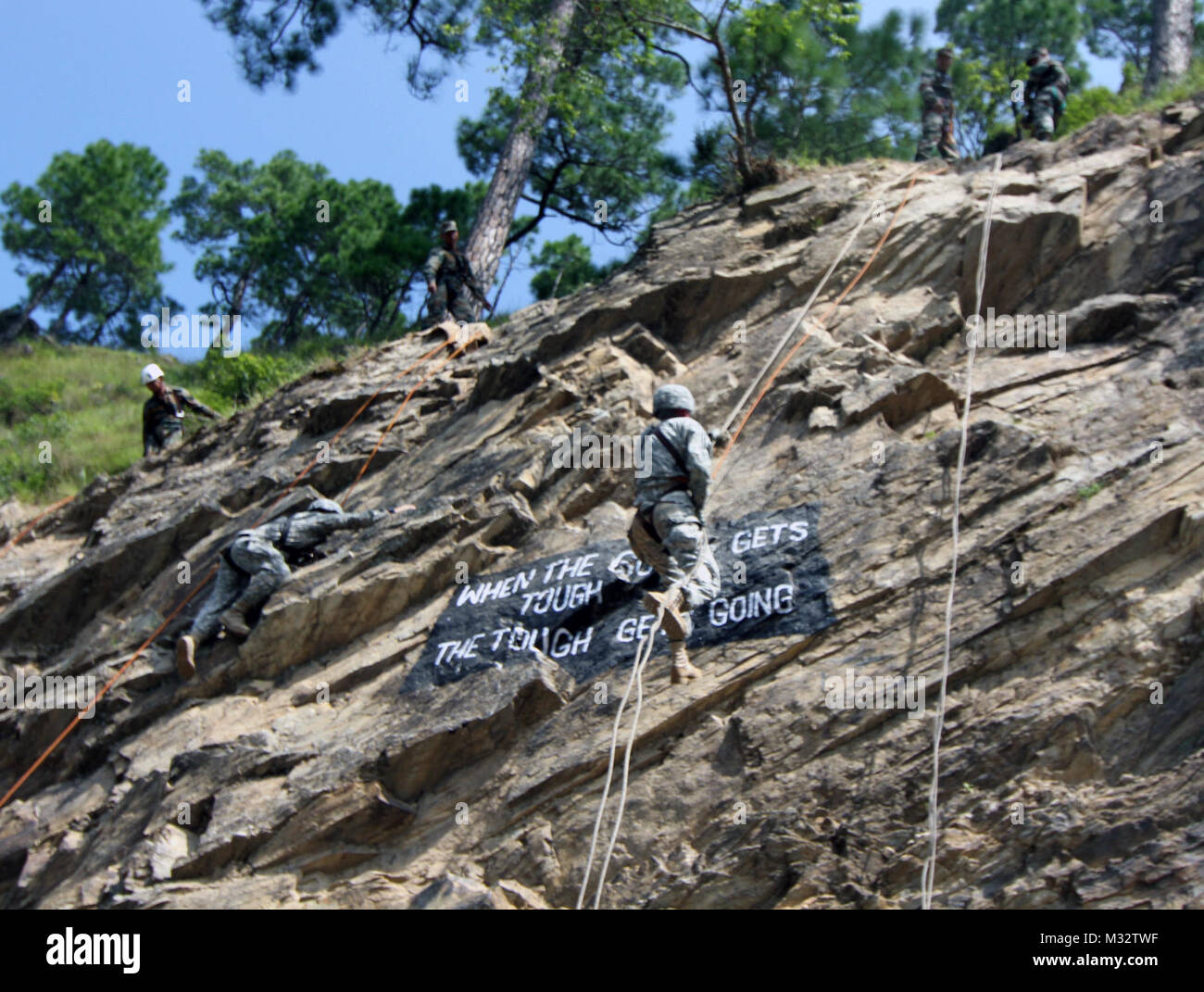 U.S. Soldiers from C Troop 5th Squadron, 1st Cavalry Regiment navigate ...