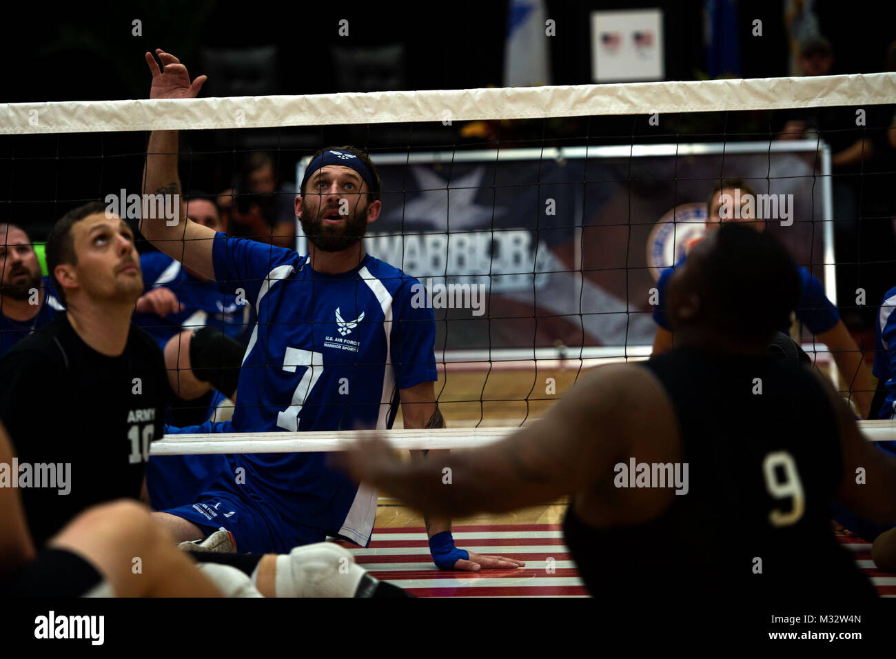 U.S. Air Force wounded warrior Ryan Gallo prepares to spike a ...