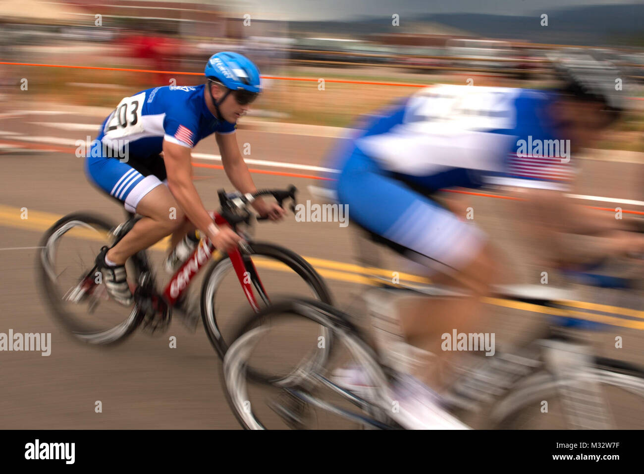 Air Force Athletes Mitchell Kieffer and Jason Hoover race by at the Men ...