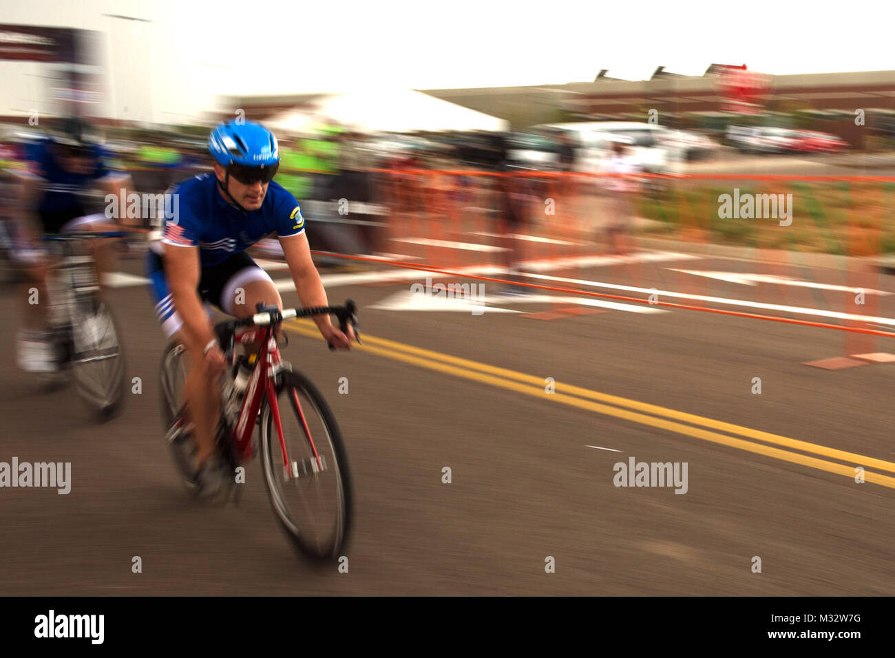 Air Force Athletes Mitchell Kieffer and Jason Hoover race by at the Men ...