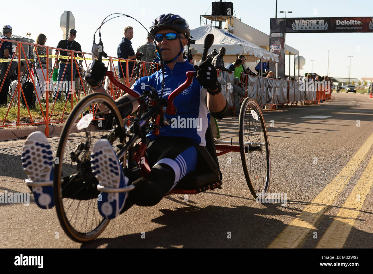 Air Force athlete Jeremiah Means participates in a cycling competition ...