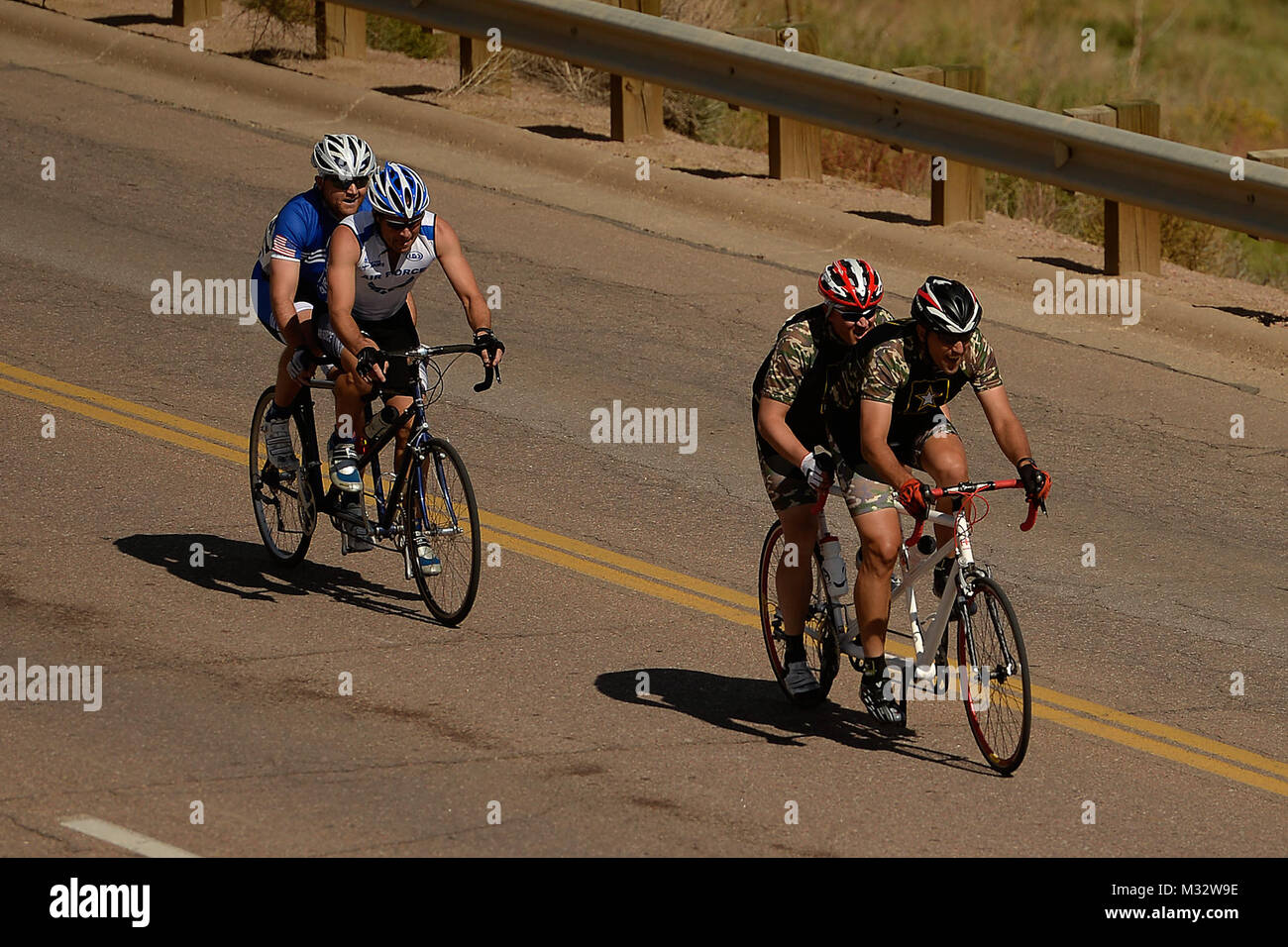 Air Force athlete Wesley Glisson and coach James Bales (left ...