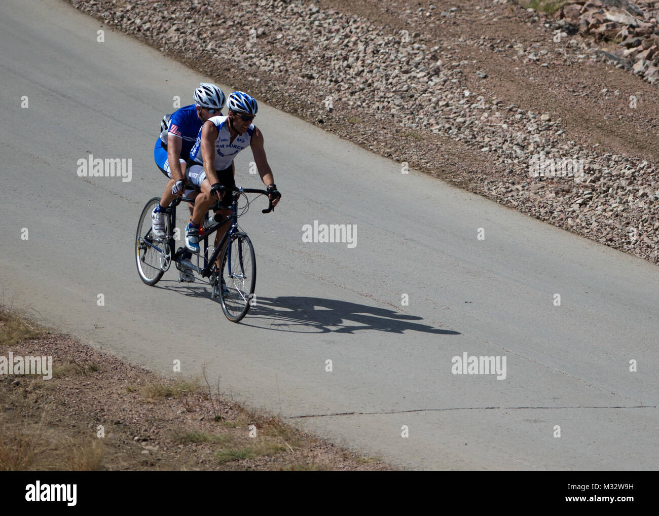 Air Force athlete Wesley Glisson (left) participates in a tandem ...