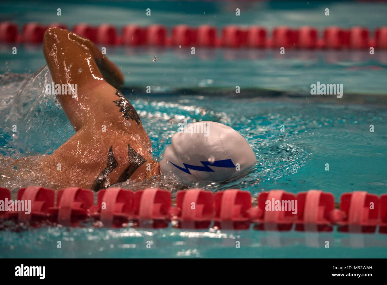 Air Force athlete Jason Hoover swims a warm up lap prior to competition ...