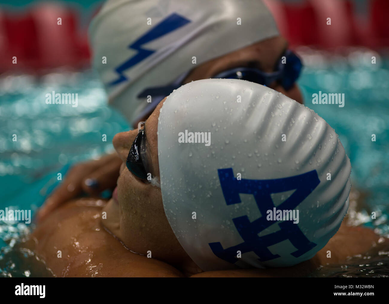 Air Force athletes congratulate each other during swimming competition ...