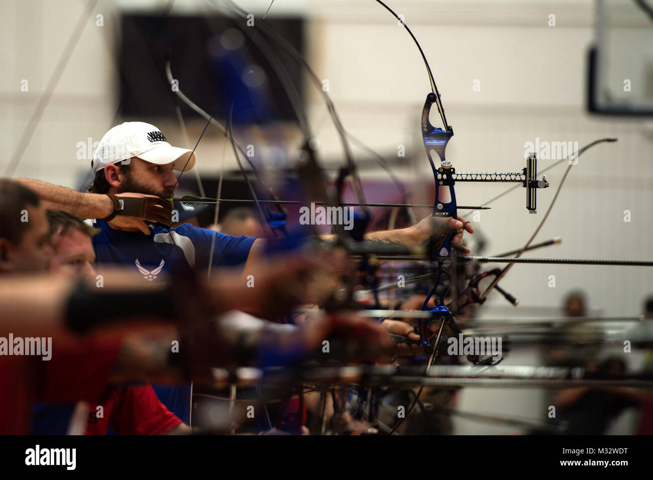 Air Force athlete Ryan Gallo aims his bow during a archery ...