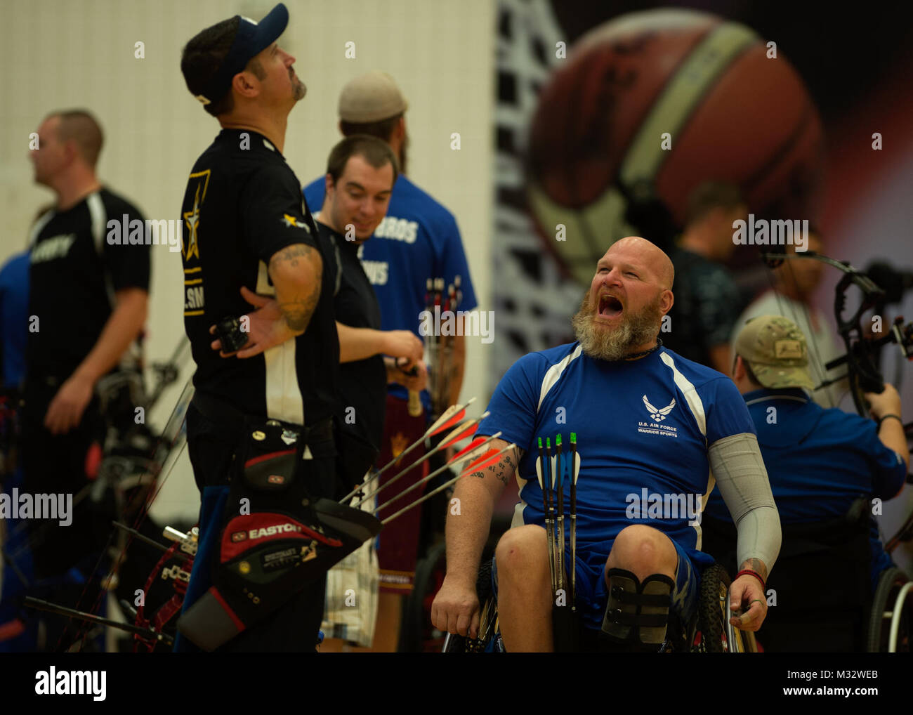 Air Force athlete Keith Sekora (right) shares a laugh with a fellow ...