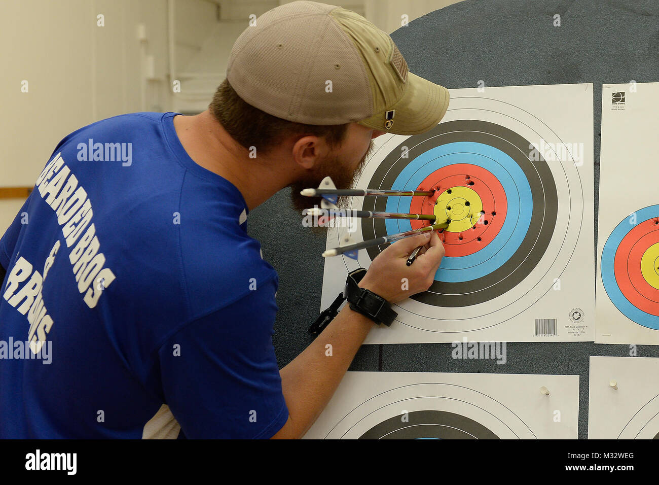 Air Force Athlete Daniel Neild marks his shots in archery competition ...