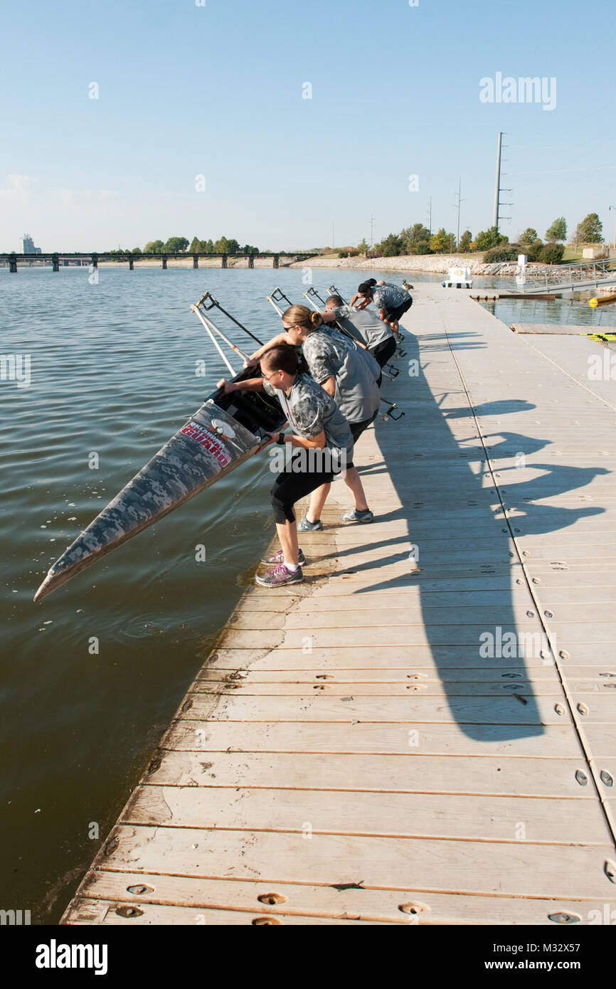 Members of the Oklahoma Army National Guard Rowing Team remove their ...