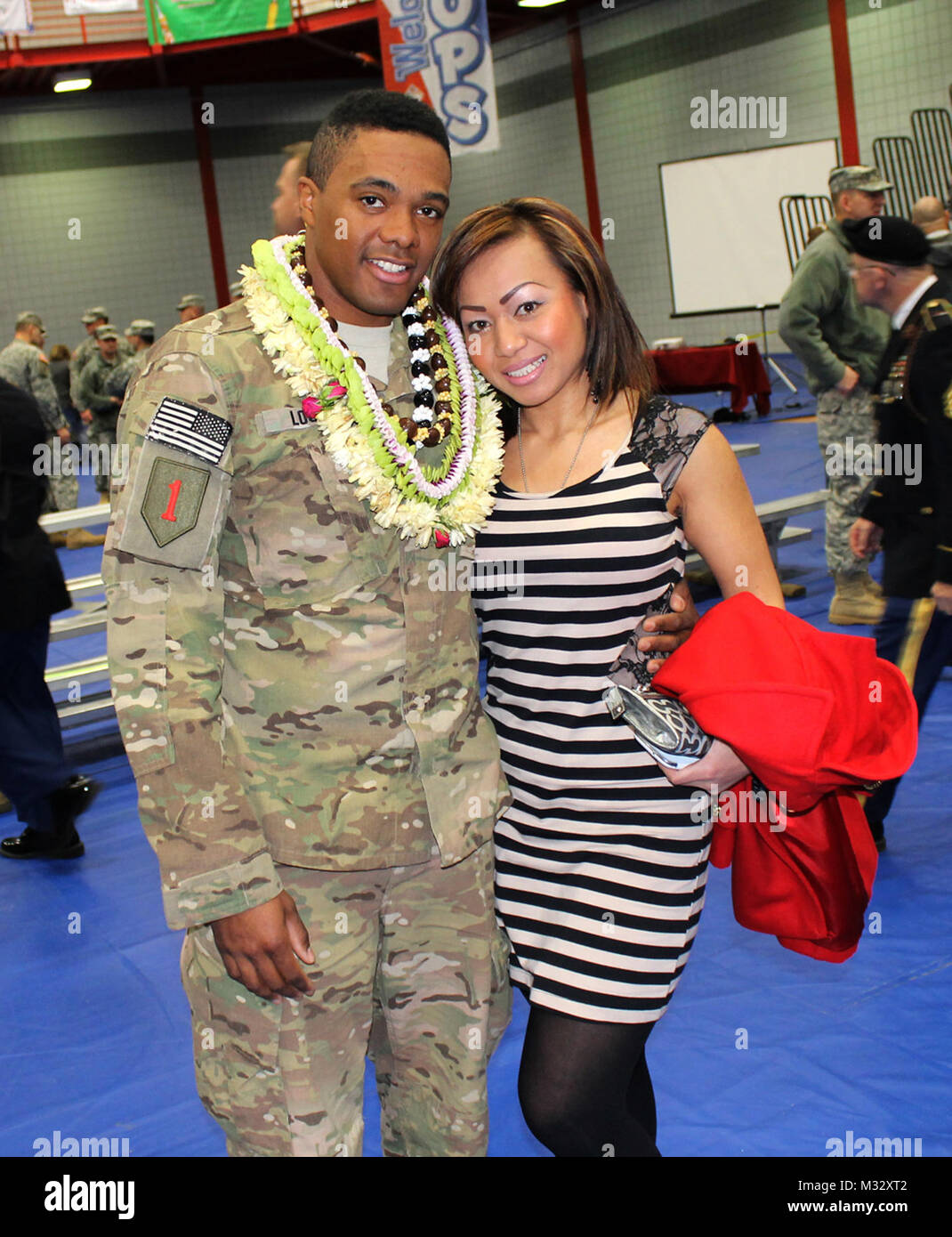 Spc. Everett Logan and his wife Cindy Logan were reunited during a ...