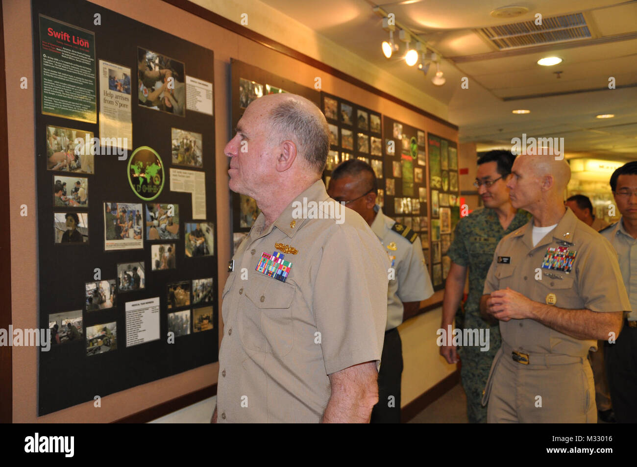 Vice Adm. Matthew Nathan and Force Master Chief Sherman Boss tour the ...