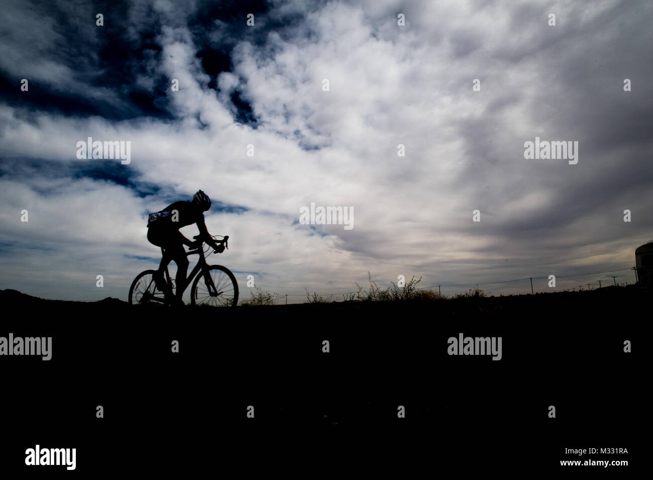 Jason Hoover, Air Force Wounded Warrior athlete, rides in a biking ...