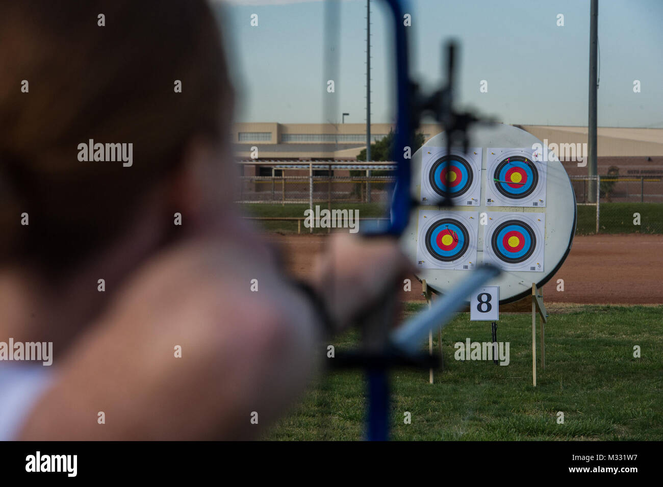 Kamee Mayfield, Air Force Wounded Warrior athlete, fires a bow during ...