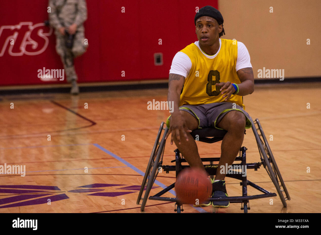 Colby Dean, Air Force Wounded Warrior athlete, moves up court during ...