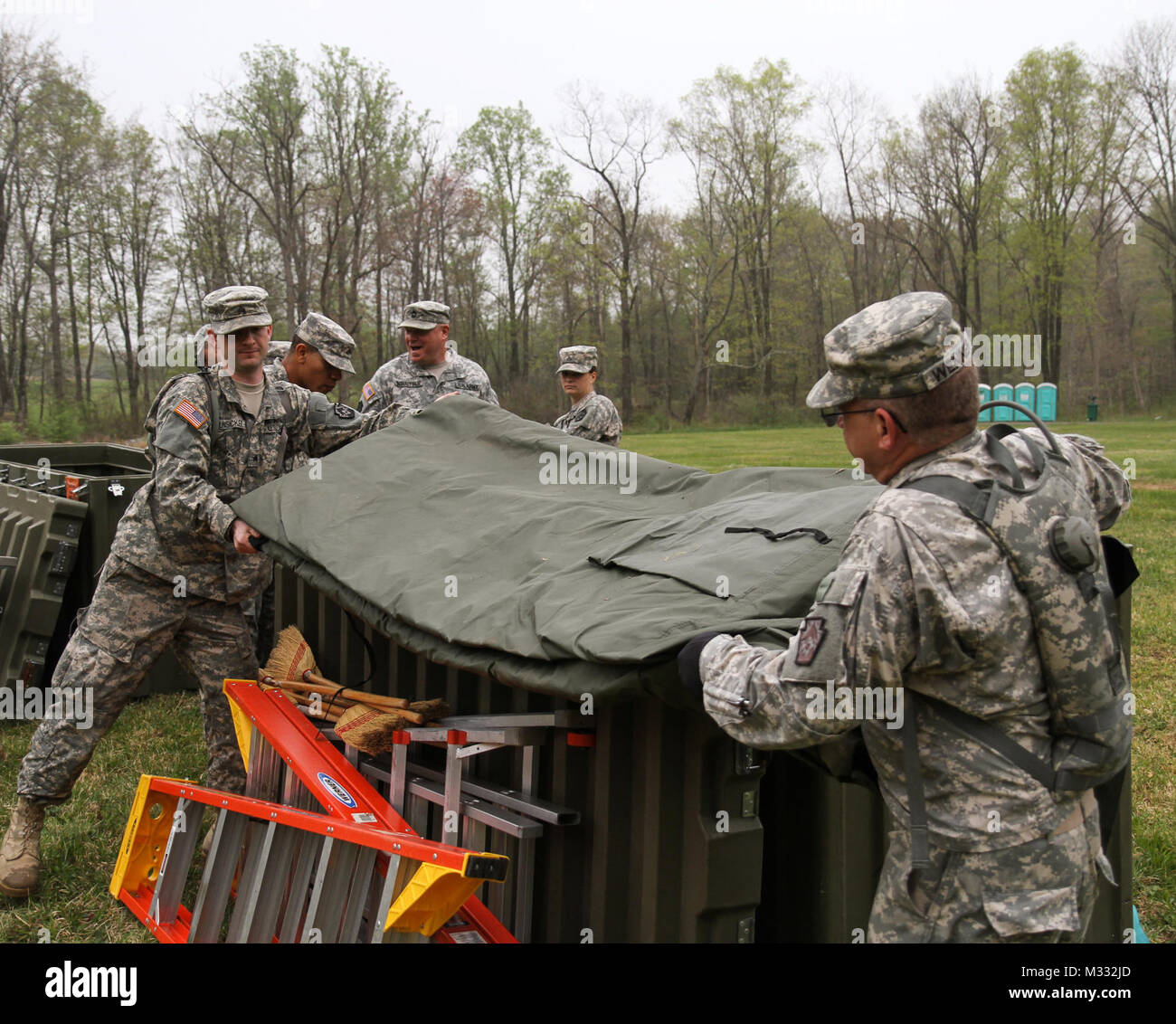 Soldiers of the 213th Regional Support Group began to set up their ...