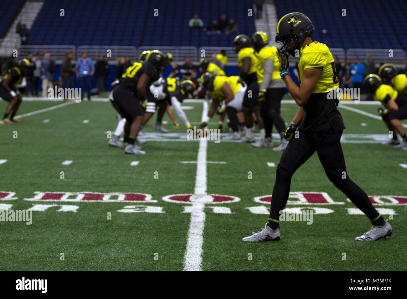 Players in the U.S. Army All-American Bowl practice in the Alamodome ...