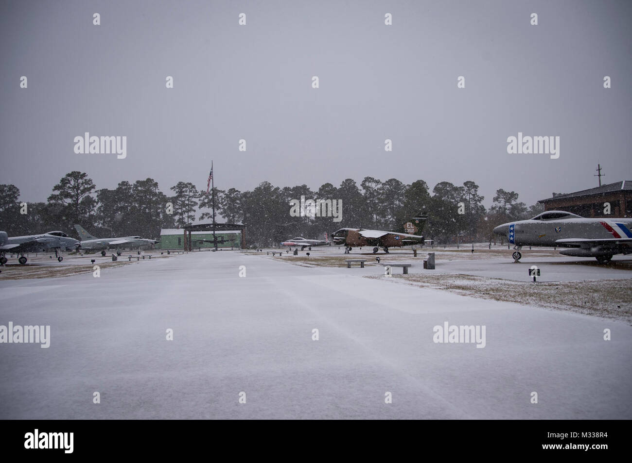 Snow covers static aircraft in the George W. Bush Air Park on Moody Air ...