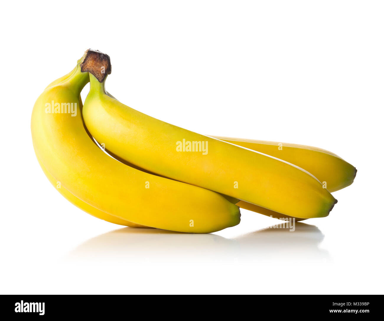 Bundle of fresh, yellow, ripe bananas over white background Stock Photo ...