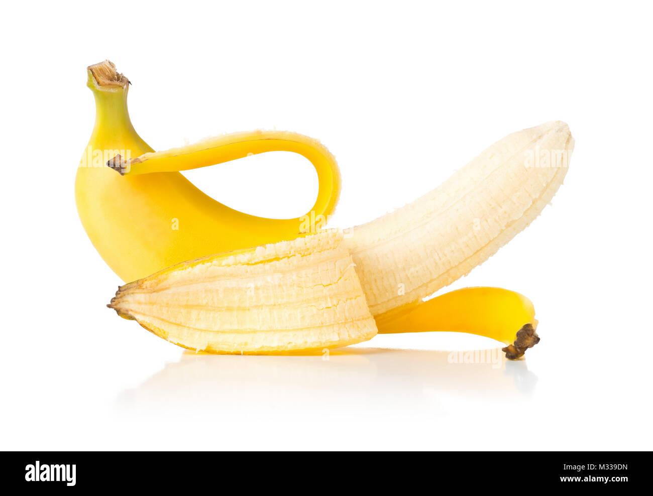 Single fresh, yellow, ripe banana half peeled over white background ...