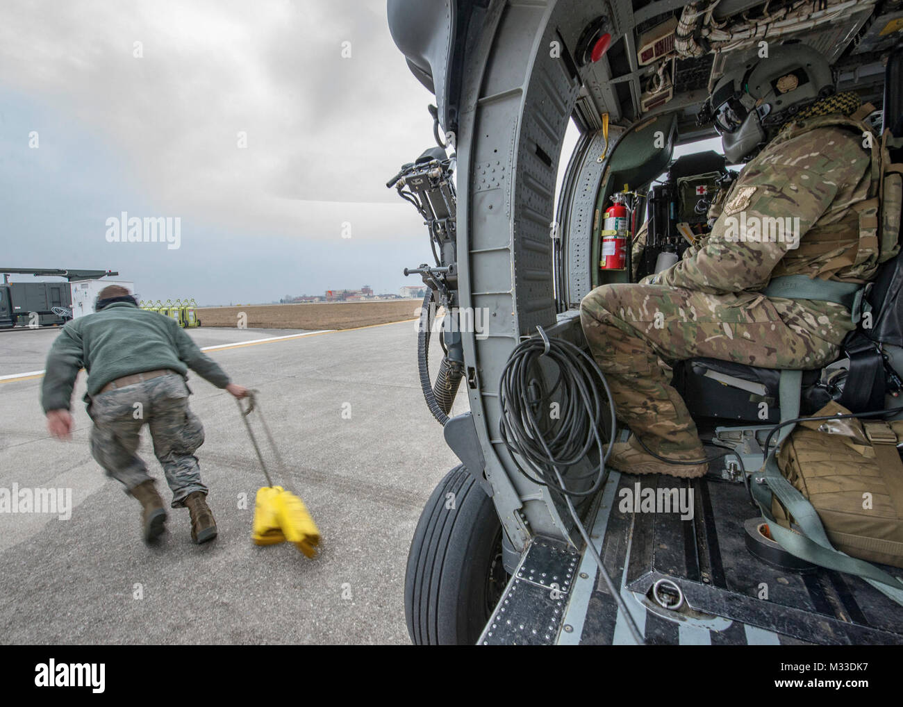 Aircrew from the 56th Rescue squadron prepare an HH-60G Pave Hawk for ...