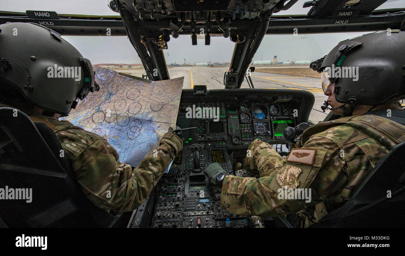 Aircrew from the 56th Rescue squadron prepare an HH-60G Pave Hawk for ...
