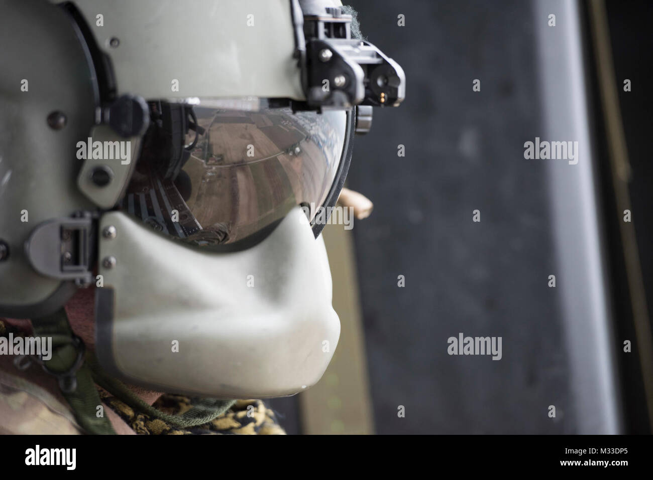 A special mission aviator assigned to the 56th Rescue Squadron looks ...