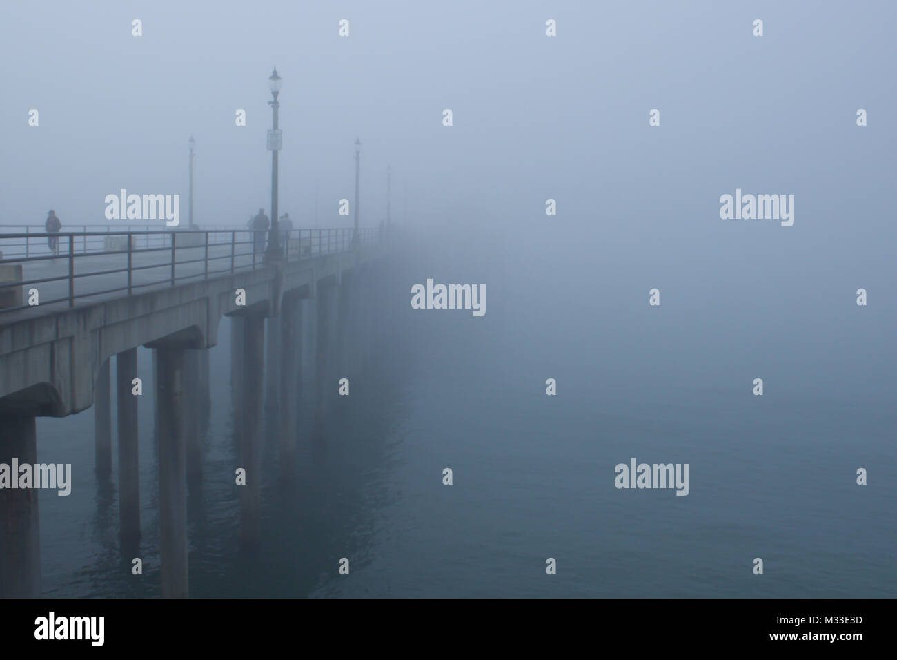 Fog pier on beach in hi-res stock photography and images - Alamy