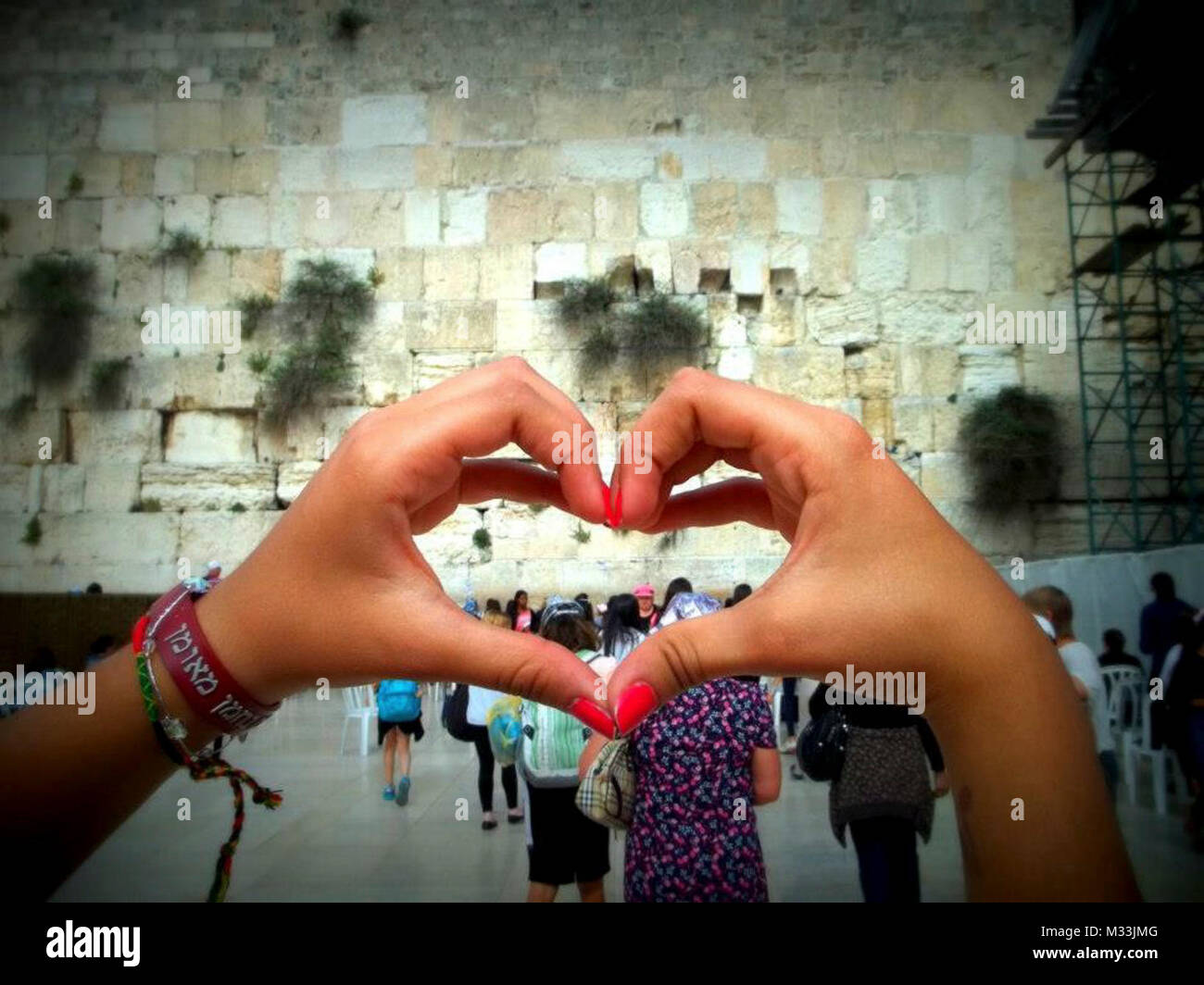 Girls hands making heart hi-res stock photography and images - Alamy