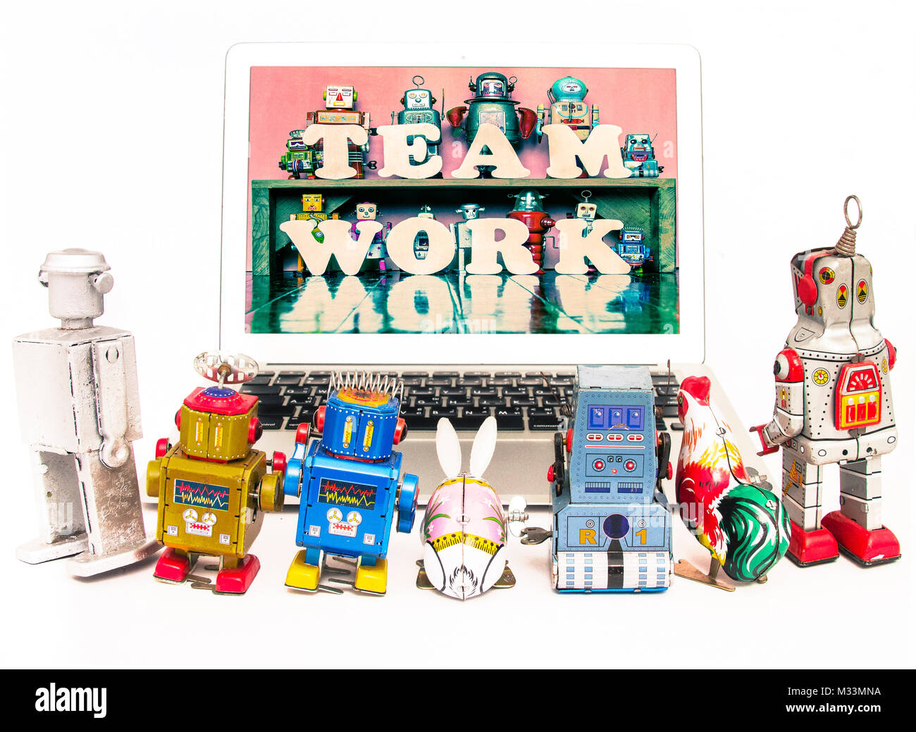 robot kids learn about team work on a laptop Stock Photo - Alamy
