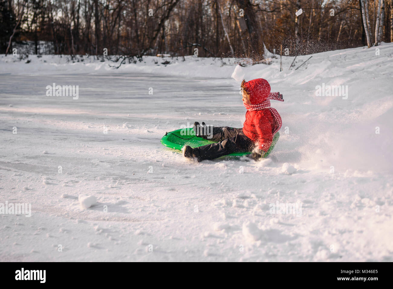 Children sledging hi-res stock photography and images - Alamy