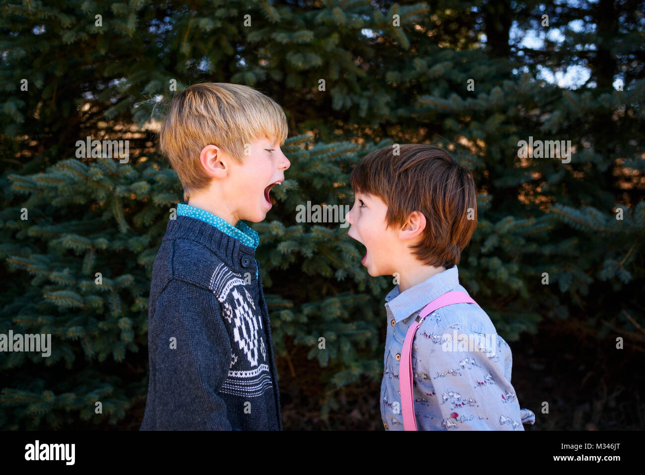 Two people standing opposite each other hi-res stock photography and ...
