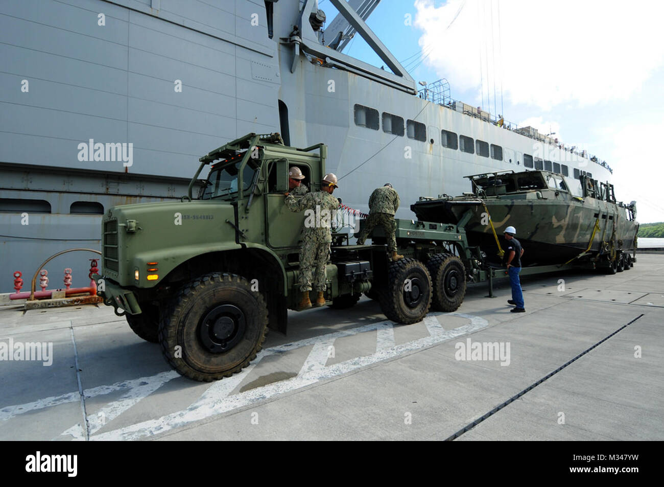 CTF 75 sailors off-load Riverine Command Boats in Guam by #PACOM Stock ...