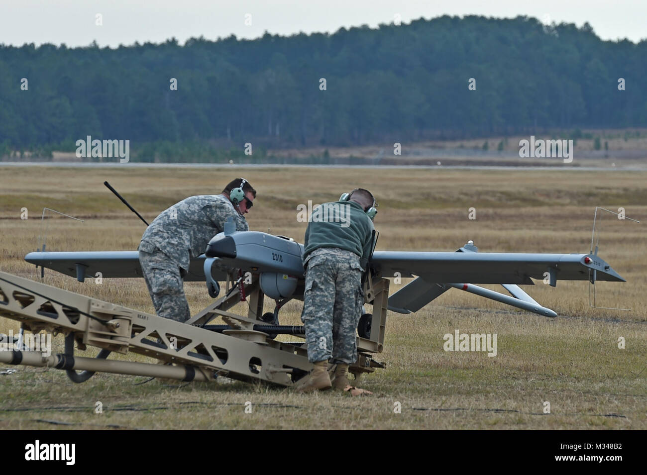 Louisiana Army National Guard Spc. Jordon Giglio and Sgt. Todd Pomier ...