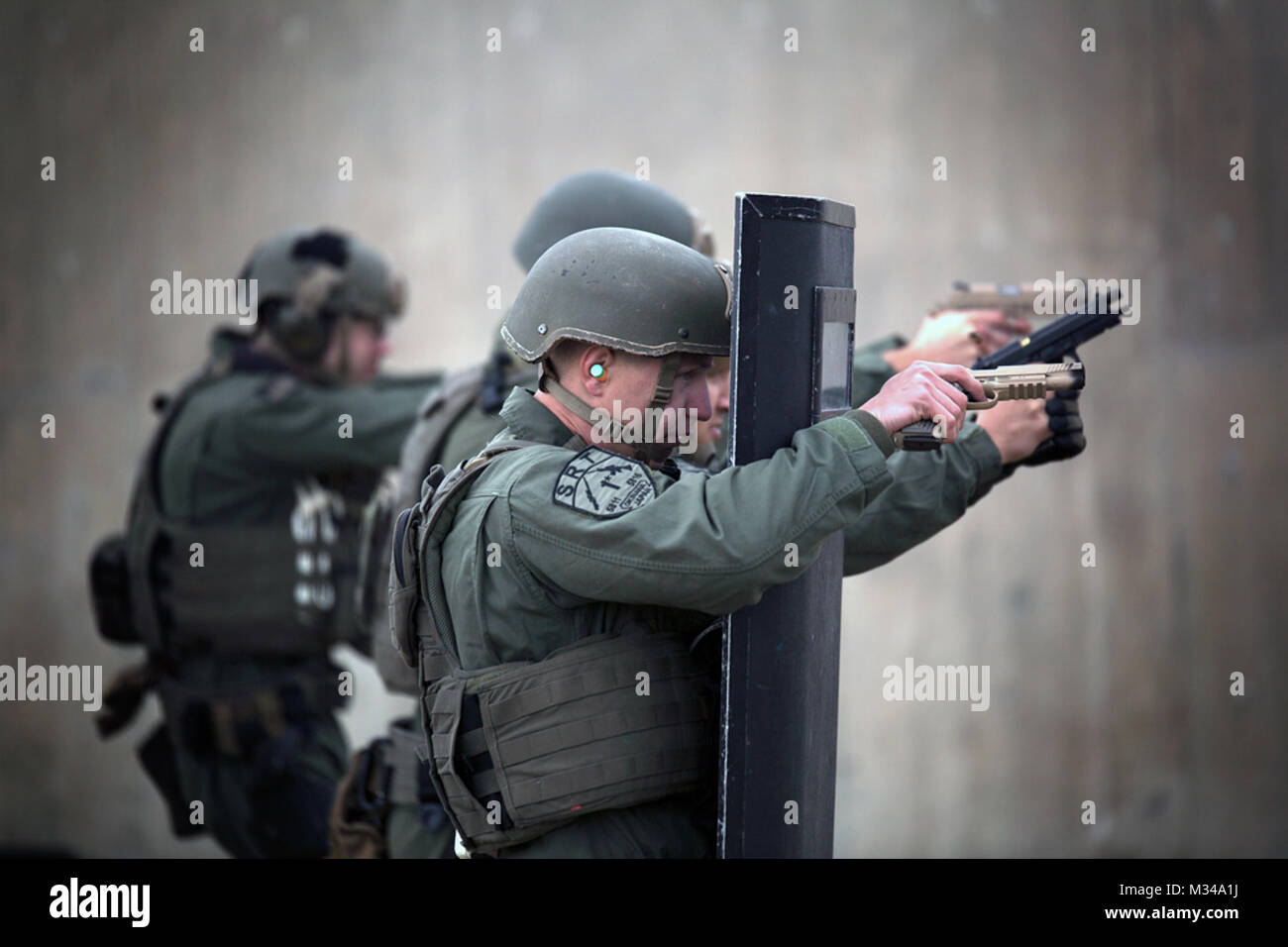 Riot pistols hi-res stock photography and images - Alamy