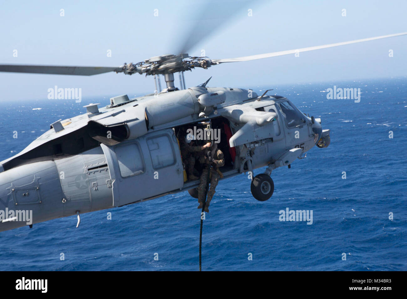 A U.S. Marine with Weapons Company, Battalion Landing Team 2nd ...
