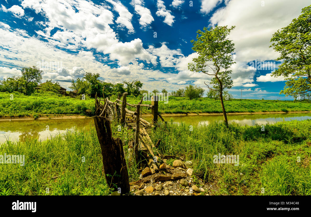 Old wooden bridge over a small river in a Georgian village Stock Photo ...