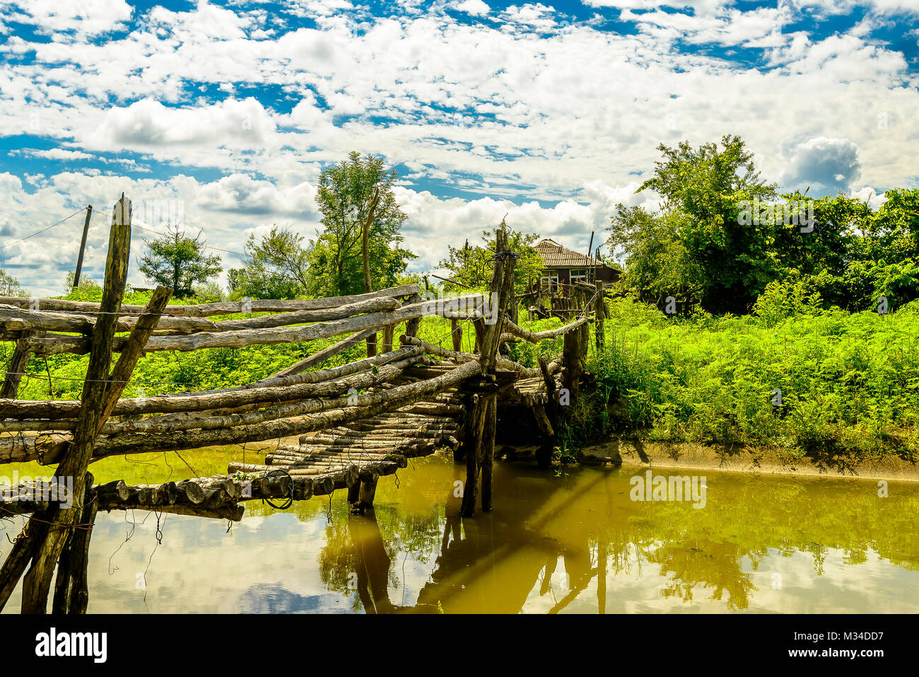 Old wooden bridge over a small river in a Georgian village Stock Photo ...