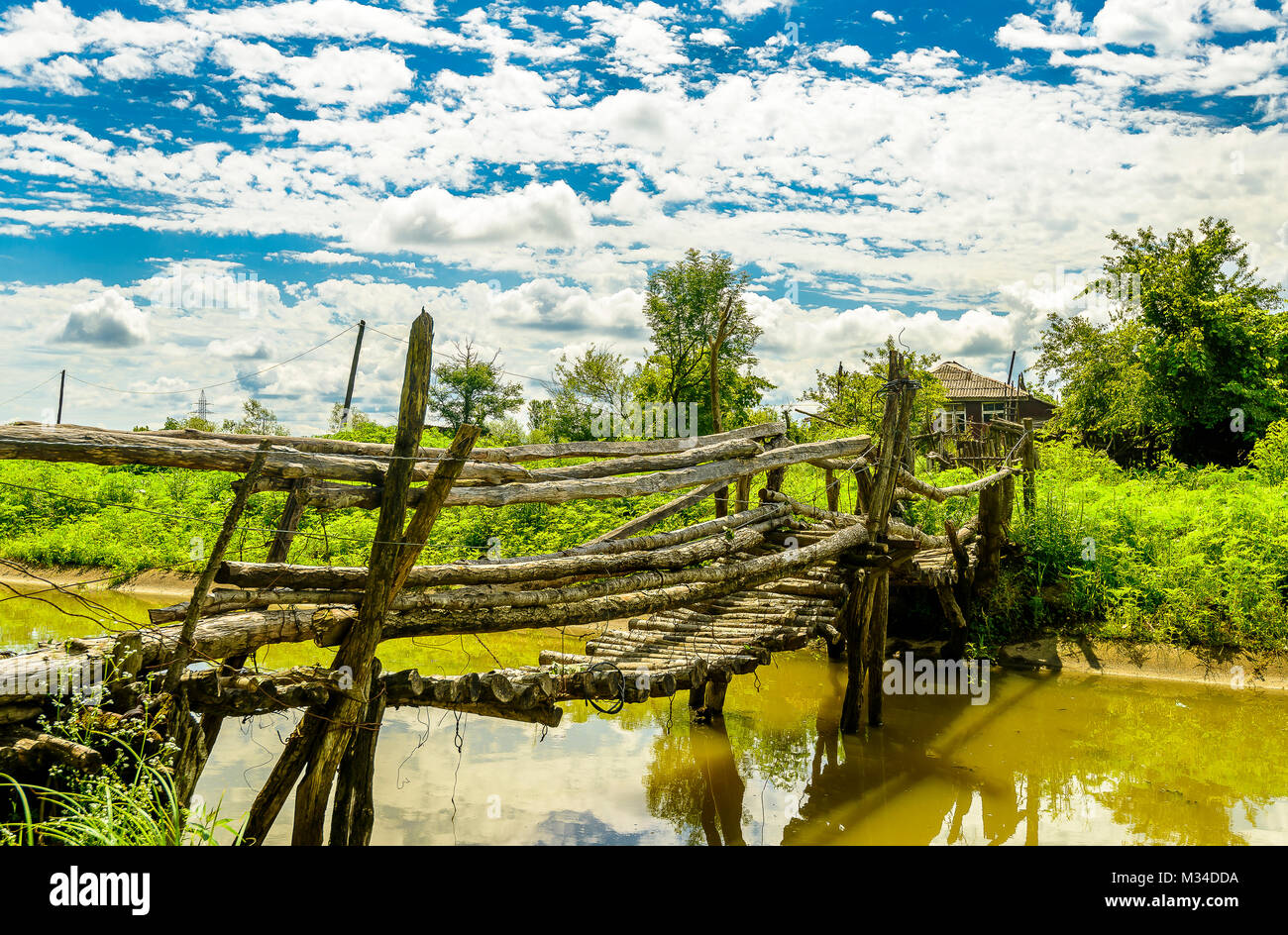 Old wooden bridge over a small river in a Georgian village Stock Photo ...