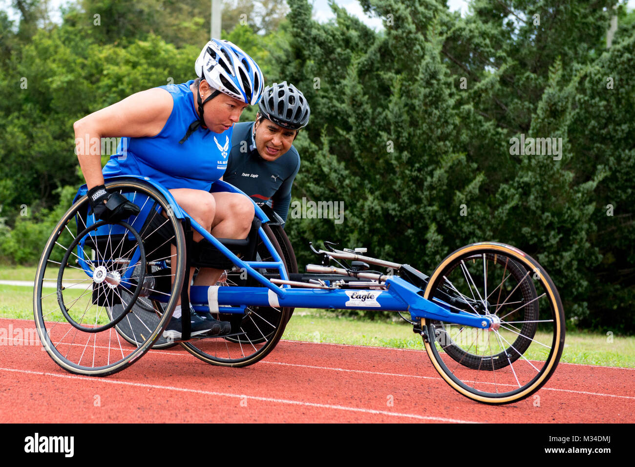 Mary McGriff, an Air Force wounded warrior athlete, races on bike with ...