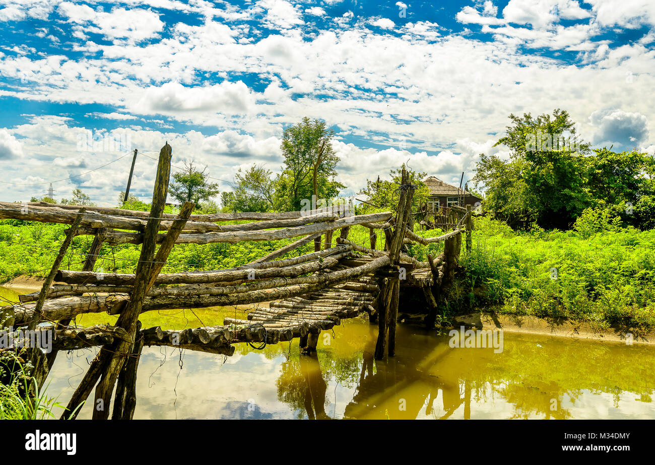 Old wooden bridge over a small river in a Georgian village Stock Photo ...