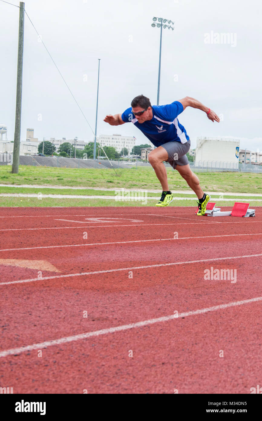 Timothy Babb, an Air Force wounded warrior athlete, burst from the ...