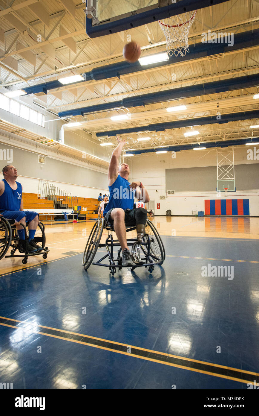 Benjamin Seekell, an Air Force wounded warrior athlete, laysup the ball ...