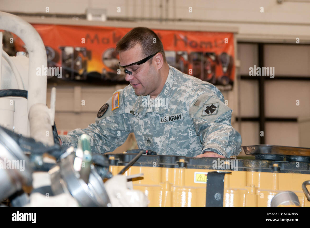 Sgt. Ted Walls, a military vehicle mechanic from Noble, Oklahoma ...
